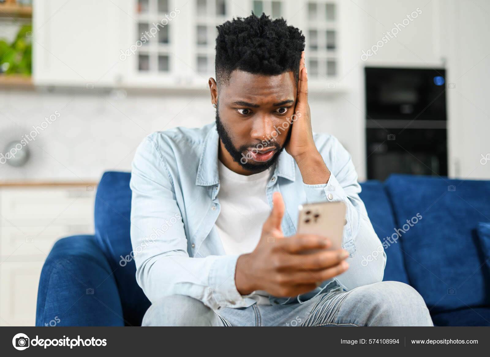 Upset Brunette Young Man Holding Smartphone Looking Disappointment Face ...