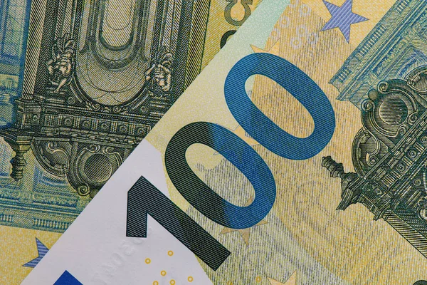 Banknote 100 euro macro shot. European currency paper money close-up ...