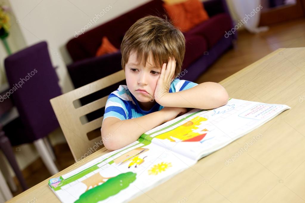 Bored little child student at home — Stock Photo © fabianaponzi #41295093