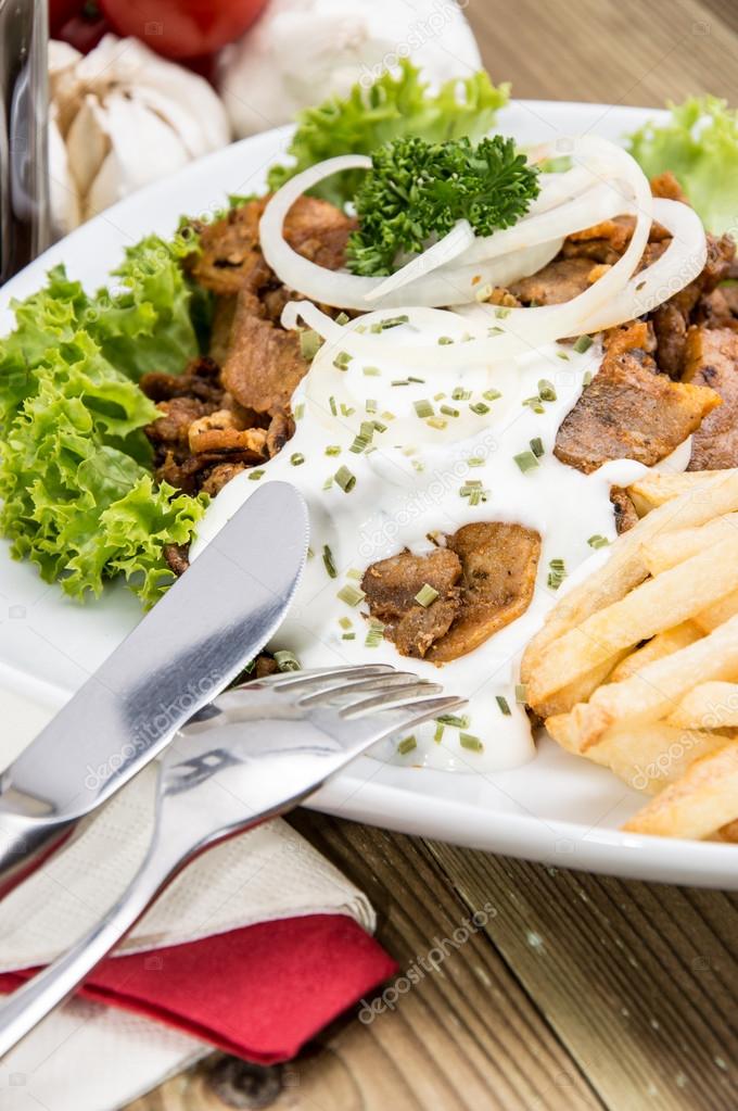 Portion of Kebab meat with Chips Stock Photo by ©HandmadePicture 12216712