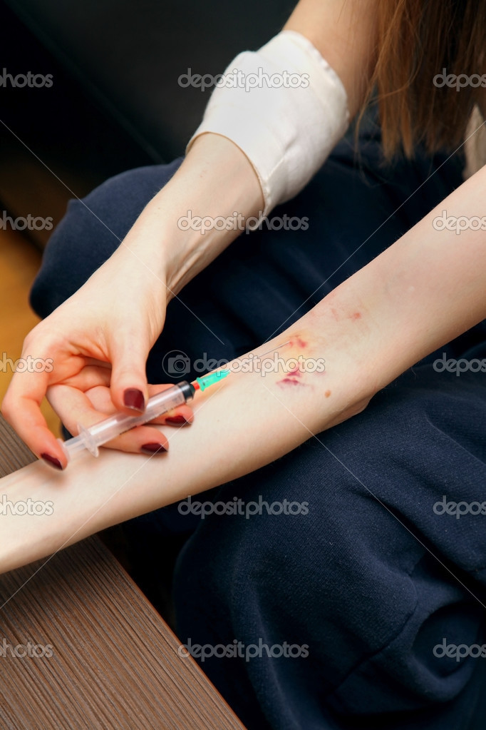 Heroin Addict Injecting