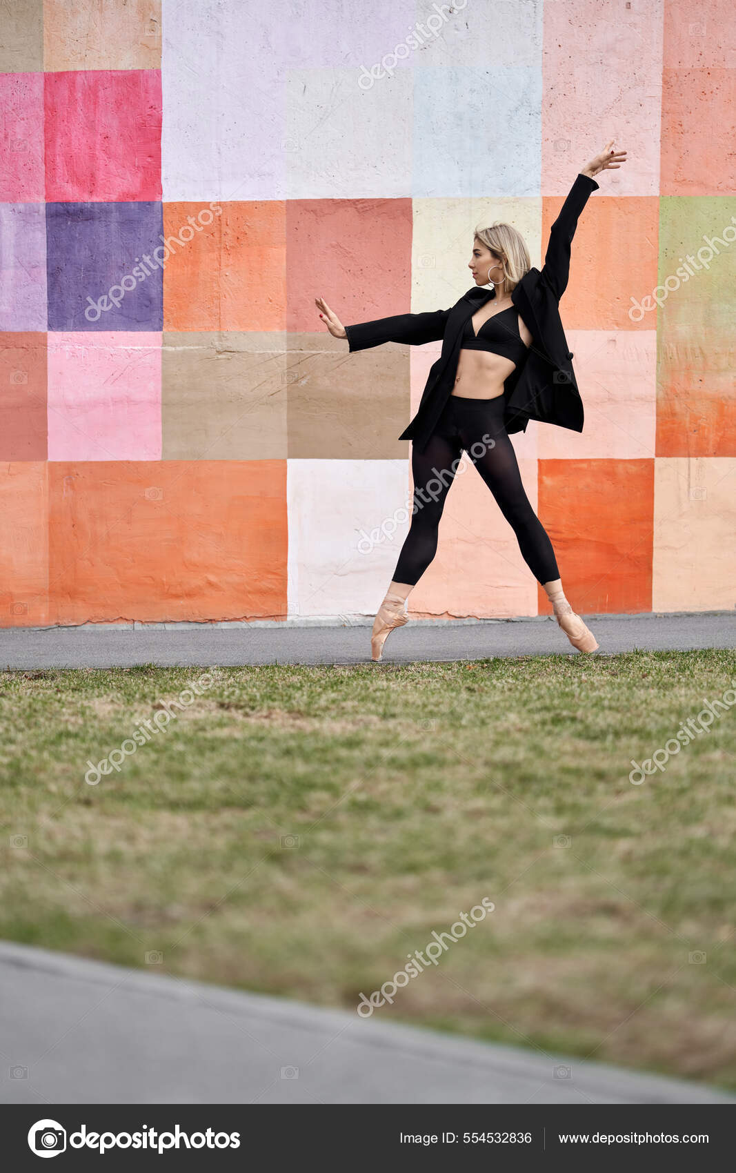 Blonde ballet dancer posing next to colorful wall Stock Photo by ...