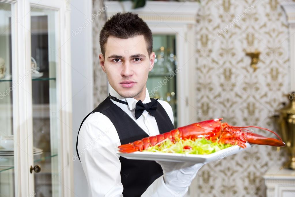 Waiter with a tray of food Stock Photo by ©Lester120 40113469