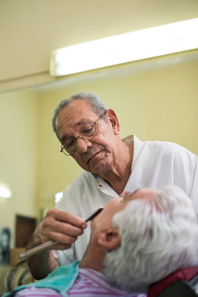 Photos: old hair salon | Portrait of old barber smiling in hair salon ...