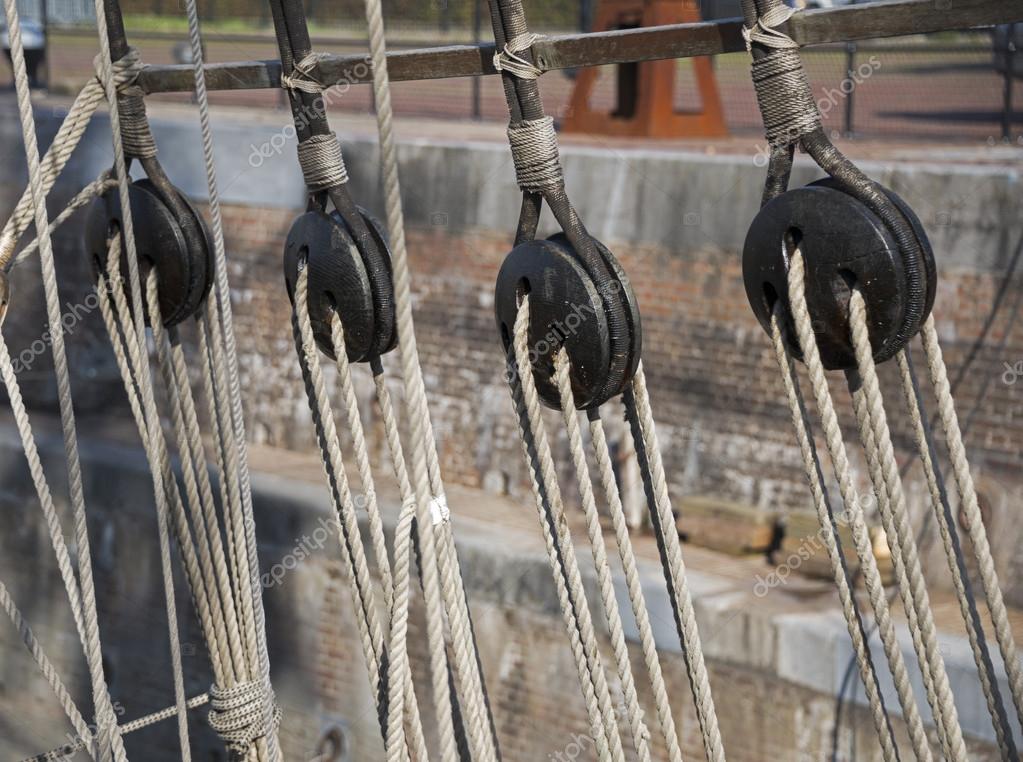 Wooden pulley with rope — Stock Photo © compuinfoto #14990655