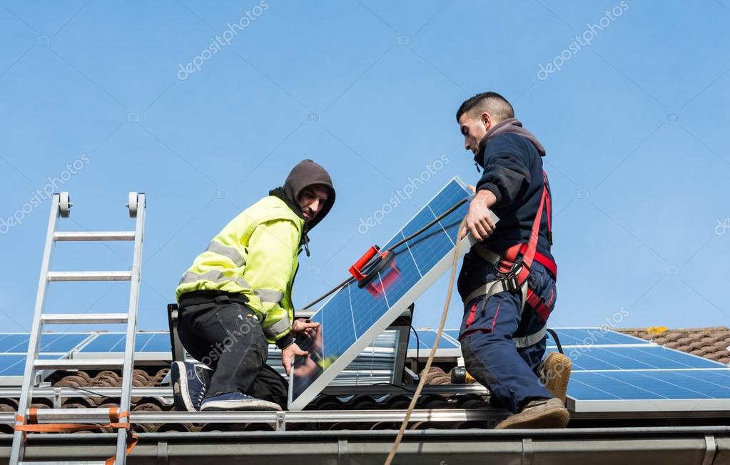 Man putting the solar panel on the roof — Stock Photo © compuinfoto ... Man putting the solar panel on the roof — Stock Photo © compuinfoto ...