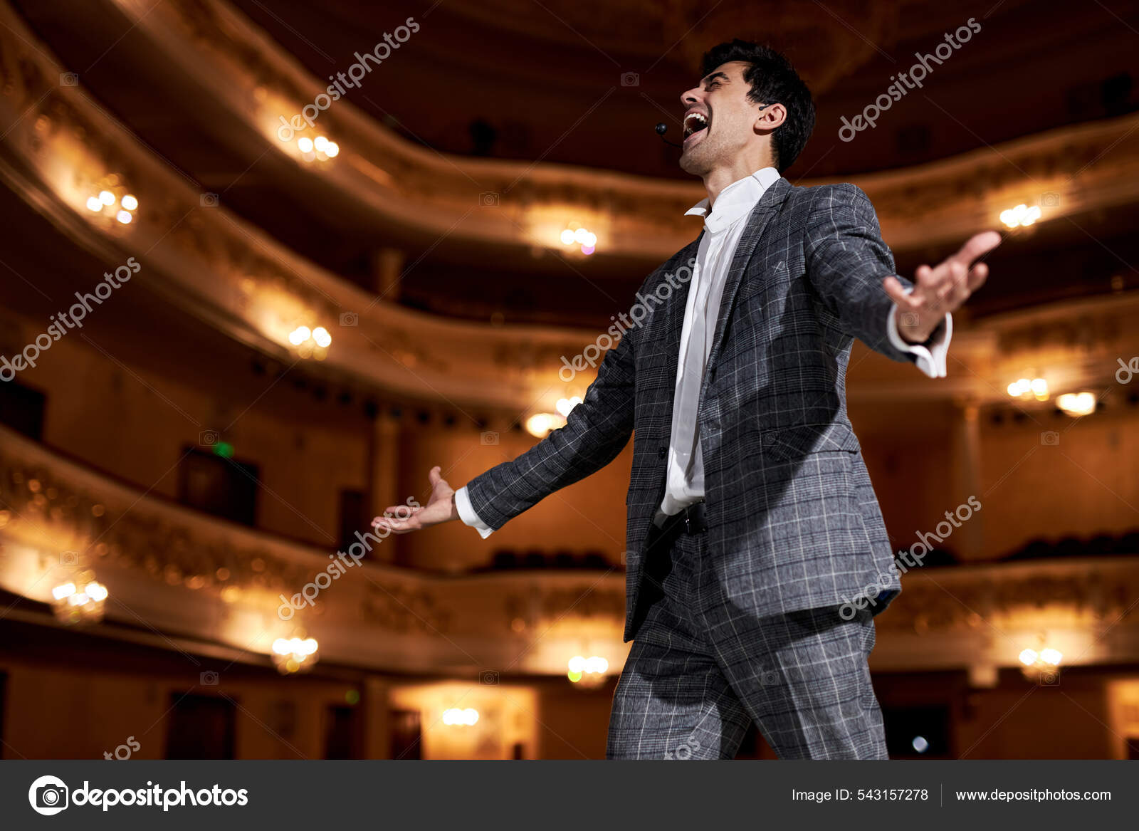 Professional opera singer in elegant classic outfit, singing hit with ...