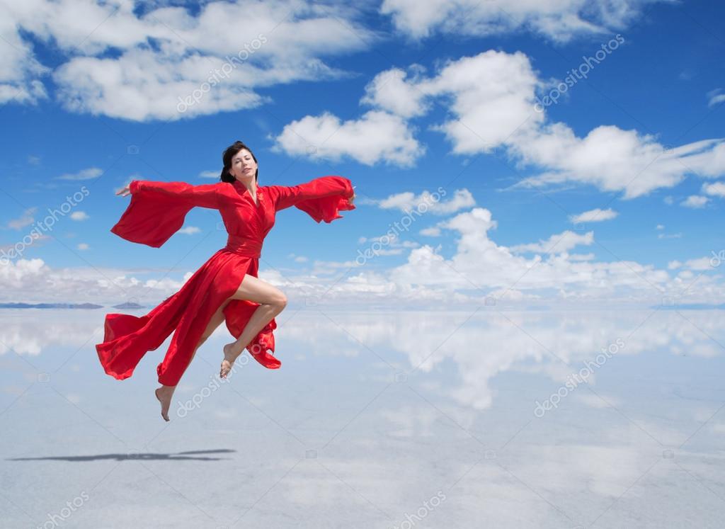 Flying woman in red kimono — Stock Photo © rod_julian #33432837