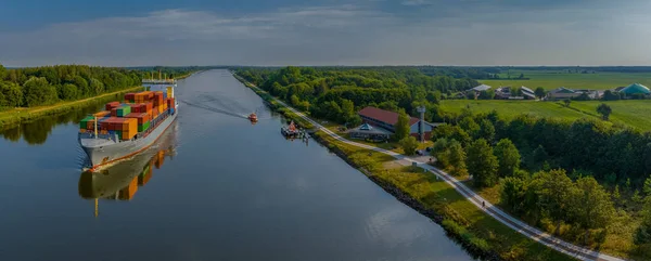 Container ship, pilot boat in action by pilot station for vessels ...