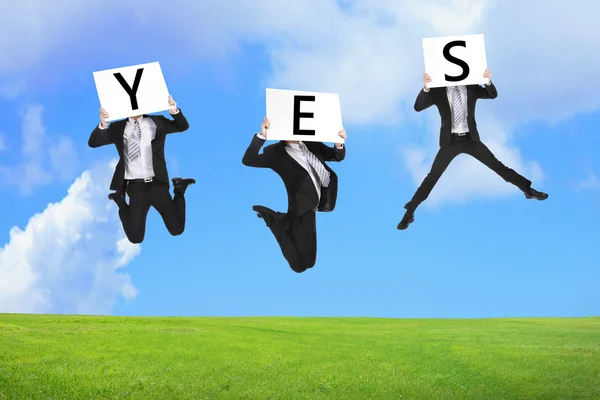 Business man happy jumping with yes text - Stock Image - Everypixel