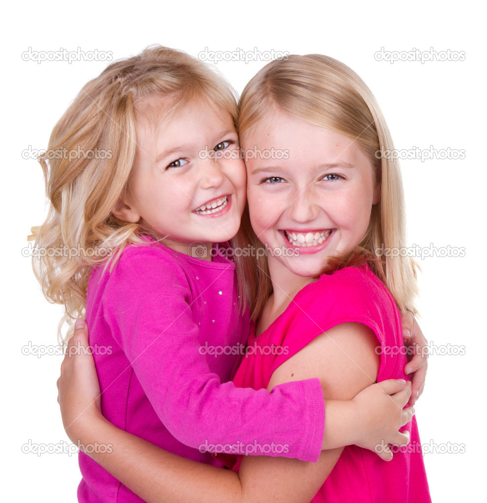 Sisters hugging — Stock Photo © sjhuls #12381864 Sisters hugging — Stock Photo © sjhuls #12381864
