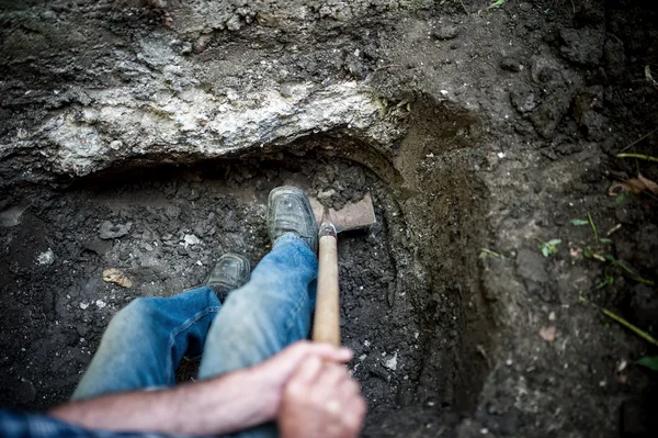 Man digging a hole in the ground with shovel and spade — Stock Photo ...