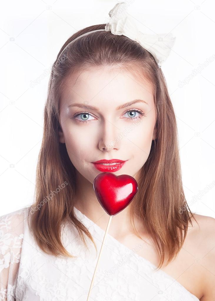 Beautiful smiling girl, red heart shape symbol - valentine s day ...