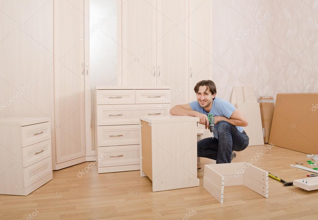 Installing furniture — Stock Photo © photoshkolnik #24830131