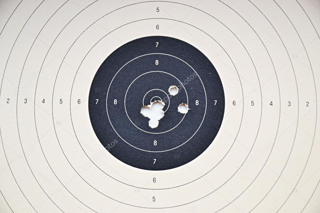 Target and holes Stock Photo by ©kytalpa 49233661