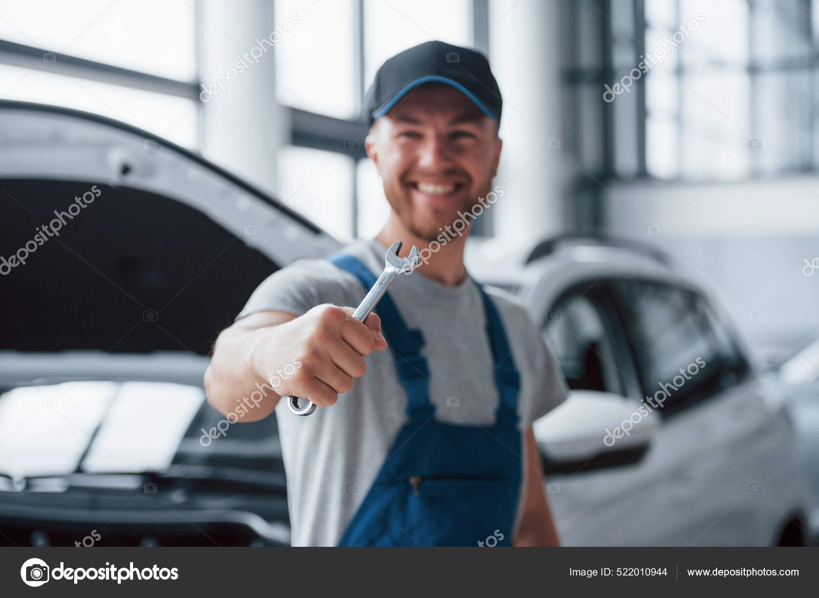 Call You Need Help Employee Blue Colored Uniform Stands Automobile ...