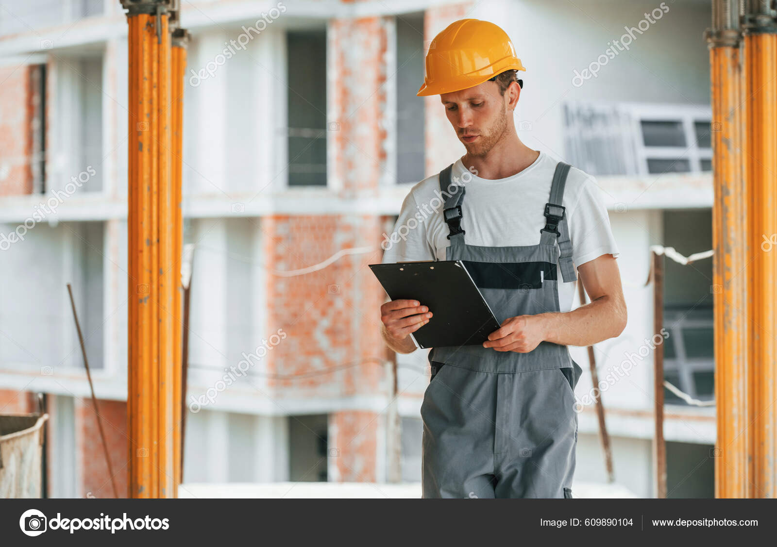Building Process Young Man Working Uniform Construction Daytime Stock ...