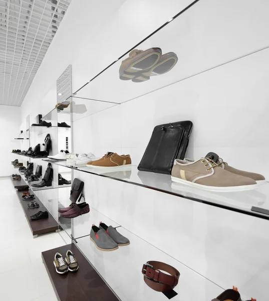 Interior of shoe store in modern european mall - Stock Image - Everypixel
