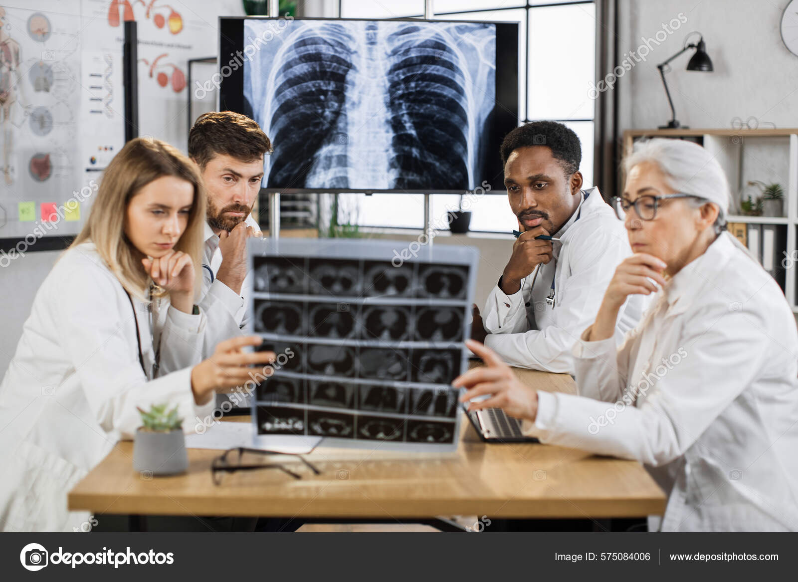 Pensive Multiracial Doctors Examining Patients Scan Chest Abdominal ...