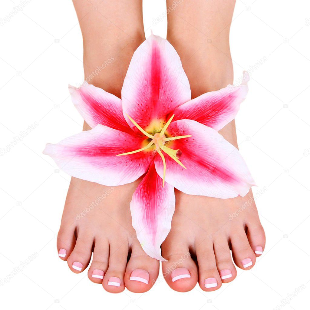 Pedicure. beautiful female feet with lily flower isolated on white, spa ...