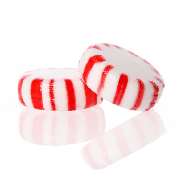 Peppermint candy isolated on white. Red striped peppermint Christmas ...
