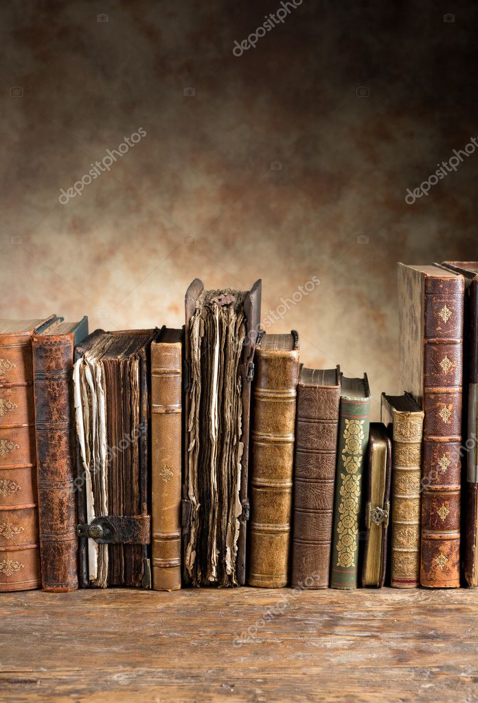 Ancient books in a row — Stock Photo © Klanneke #30961179 Ancient books in a row — Stock Photo © Klanneke #30961179