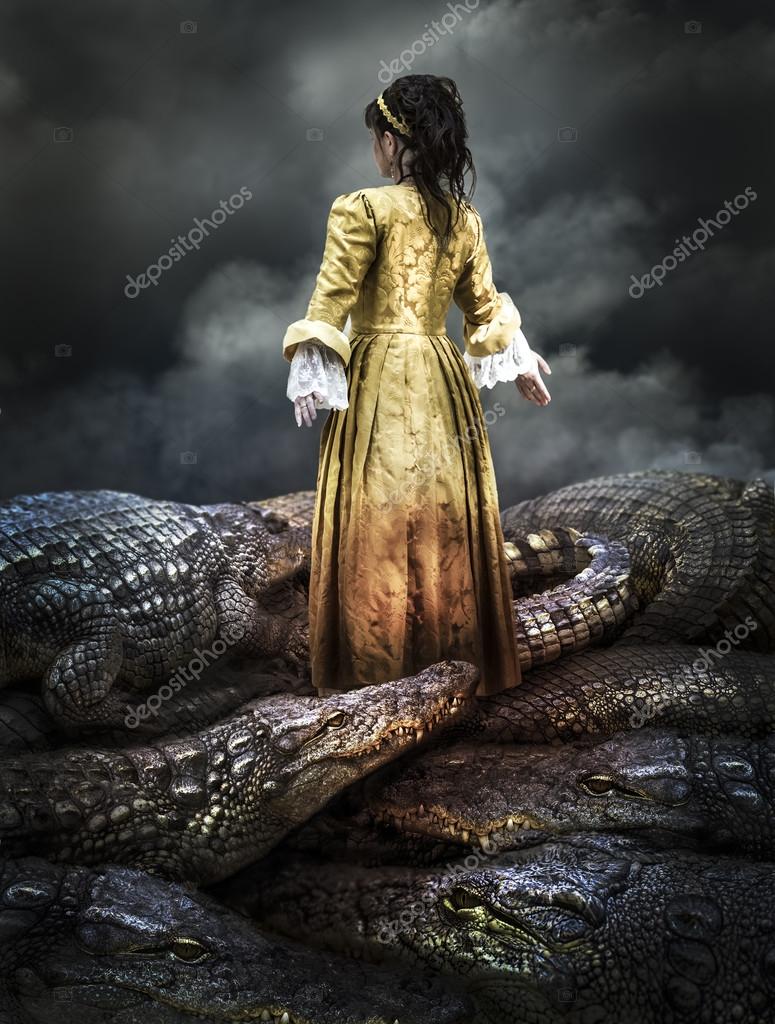 Medieval young girl surrounded by crocodiles — Stock Photo ...