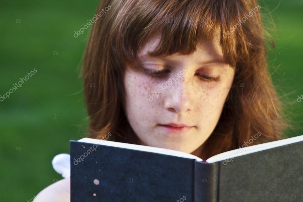 Girl reading a book Stock Photo by ©outsiderzone 40897993