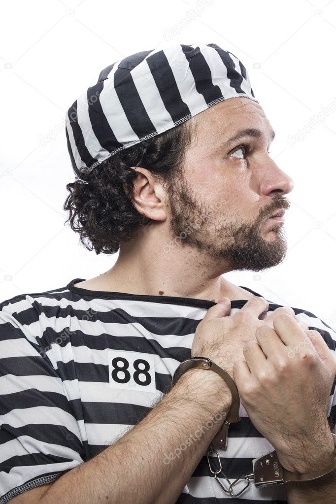 Man prisoner in prison garb Stock Photo by ©outsiderzone 41633087