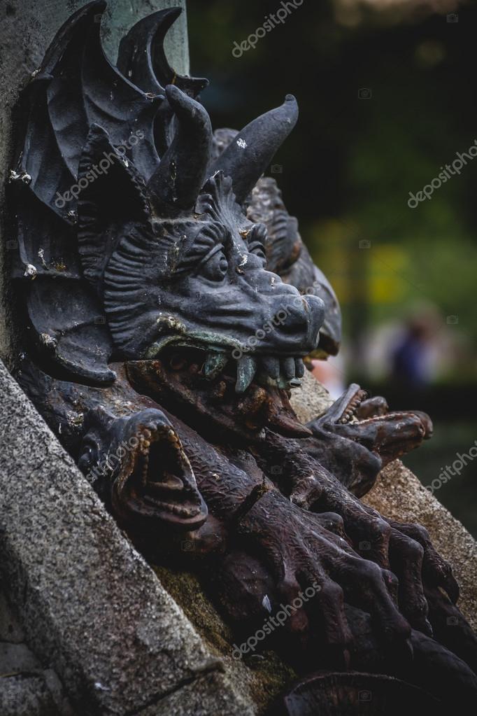 Bronze sculpture with demonic gargoyles — Stock Photo © outsiderzone ...