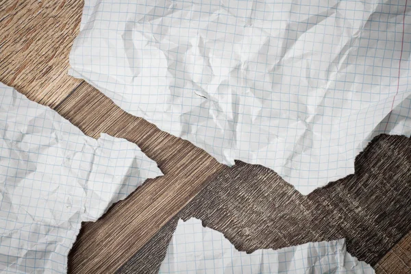 Crumpled and torn paper on the table. Notepad on crumpled paper ...