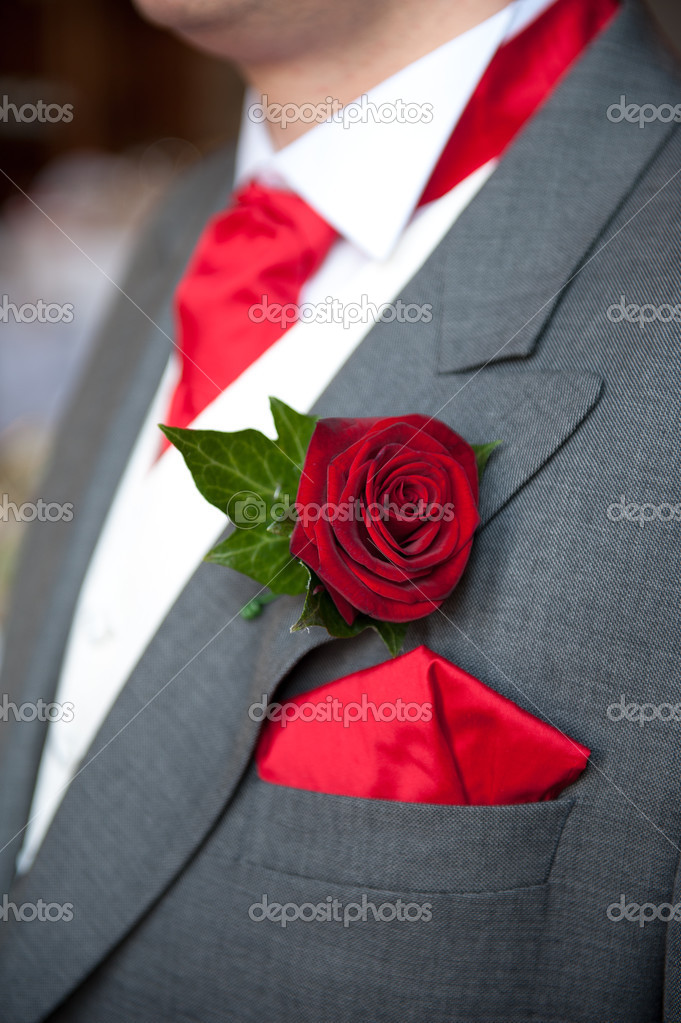 Groom red rose buttonhole wedding — Stock Photo © eelnosiva #23621947