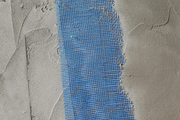 Wall insulation, mortar and mesh Stock Photo by ©simazoran 47814403