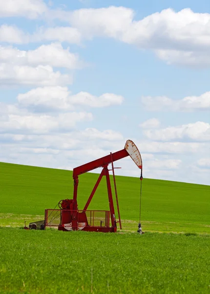 Oil pump on wide open prairie Stock Photo by ©okiepony 64327845