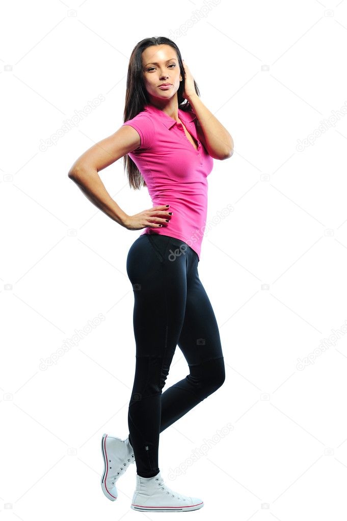 Happy smiling and energetic fit female fitness model in pink top ...