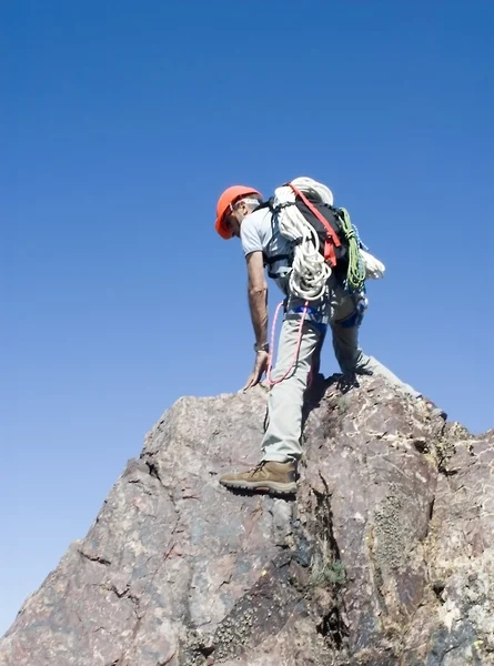 Rock climbing team reaching the summit. — Stock Photo © gregepperson ...