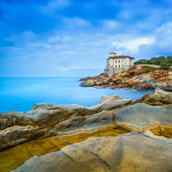 Boccale castle landmark on cliff rock and sea. Tuscany, Italy. Long ...