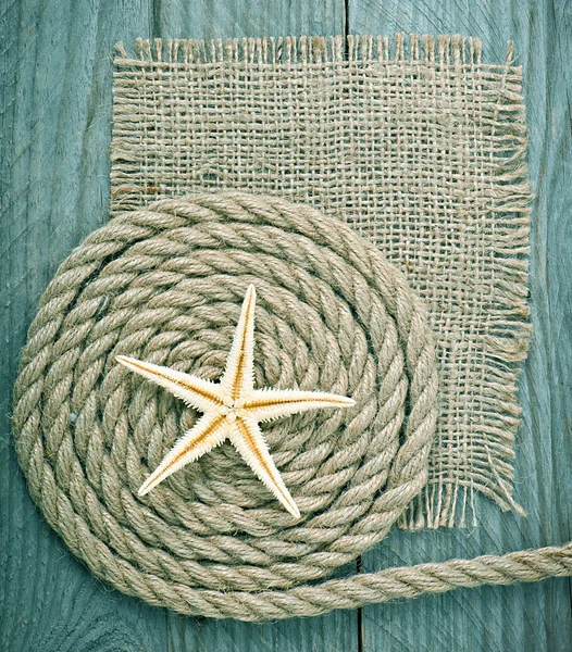 Ship rope on wooden texture background — Stock Photo © Taddeus #51045537