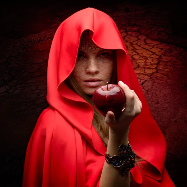 Beautiful woman with red cloak Stock Photo by ©bereta 42287549