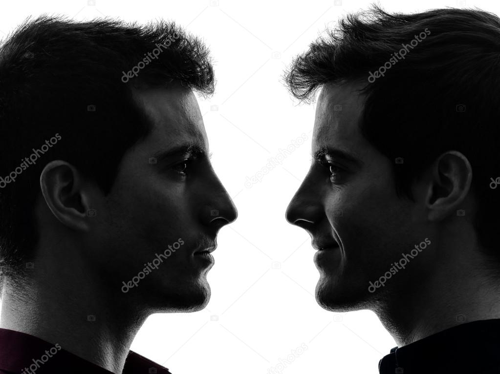 Close up portrait two men twin brother friends silhouette Stock Photo ...