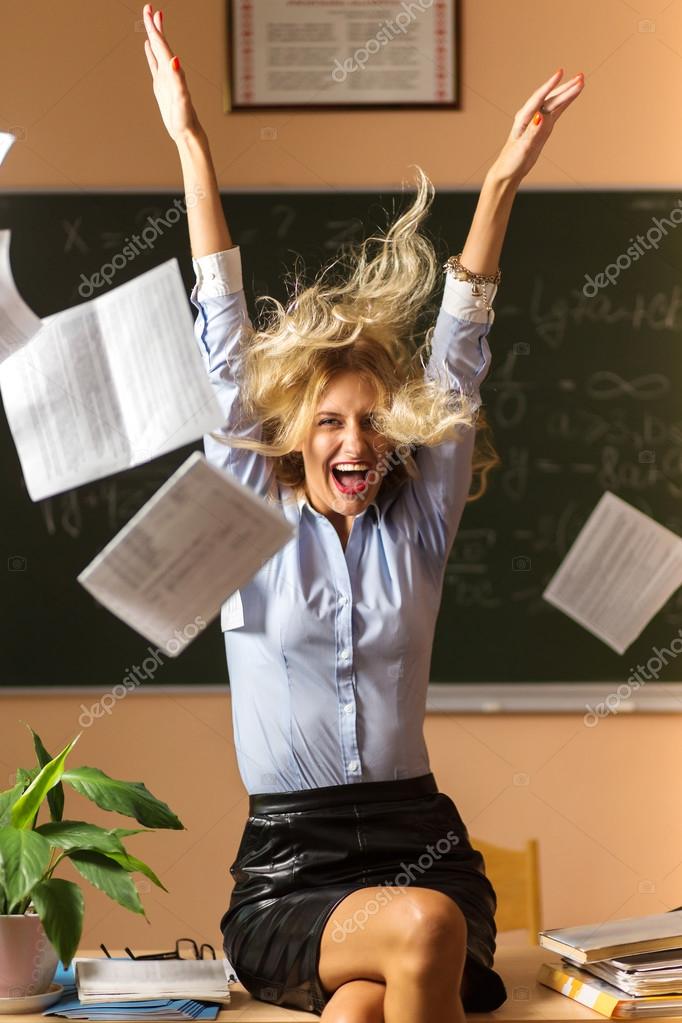 Young pretty teacher screaming — Stock Photo © Aksakal #39944619 Young pretty teacher screaming — Stock Photo © Aksakal #39944619