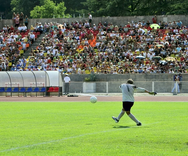 Goalkeeper hit the ball - Stock Image - Everypixel