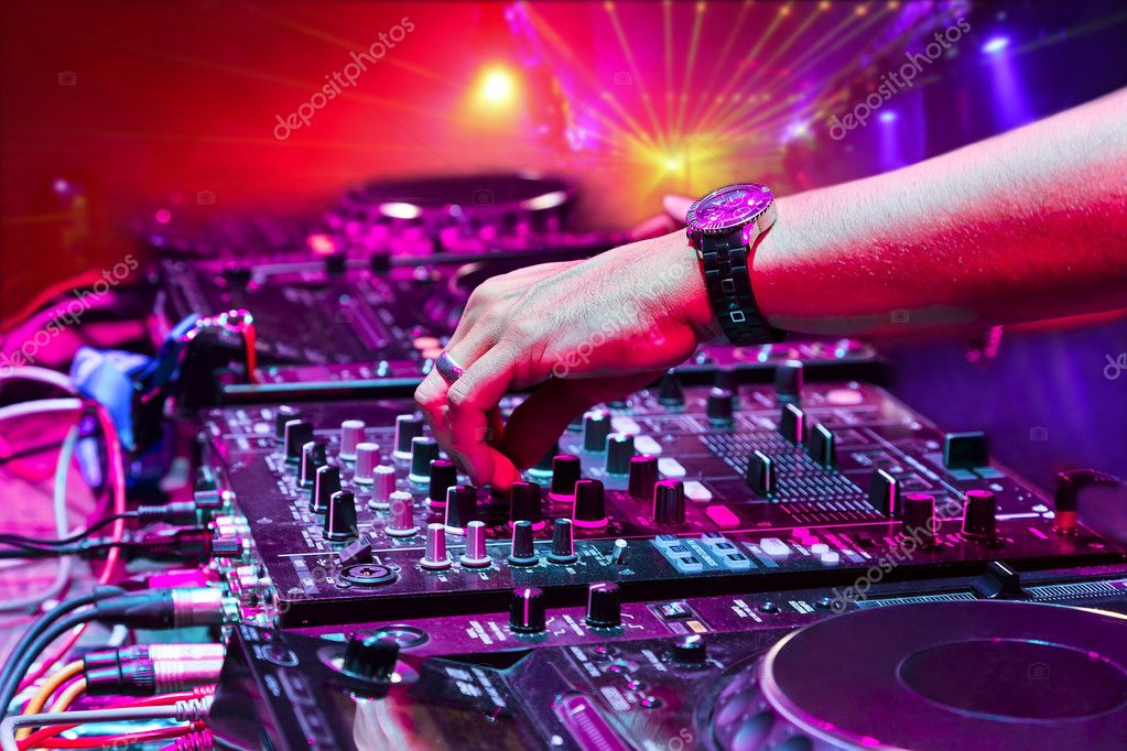 Dj playing the track ⬇ Stock Photo, Image by © maxoidos #14345175