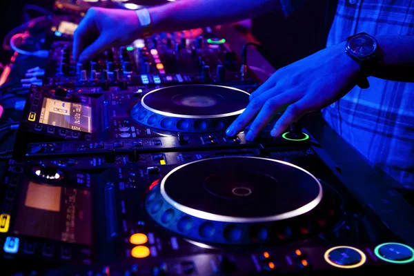 Dj playing the track — Stock Photo © maxoidos #26300875