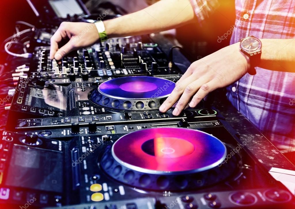 Dj playing the track — Stock Photo © maxoidos #26300875