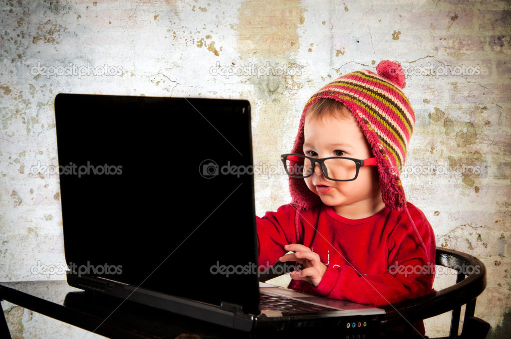 Baby and computer Stock Photo by ©uroszunic 39388893