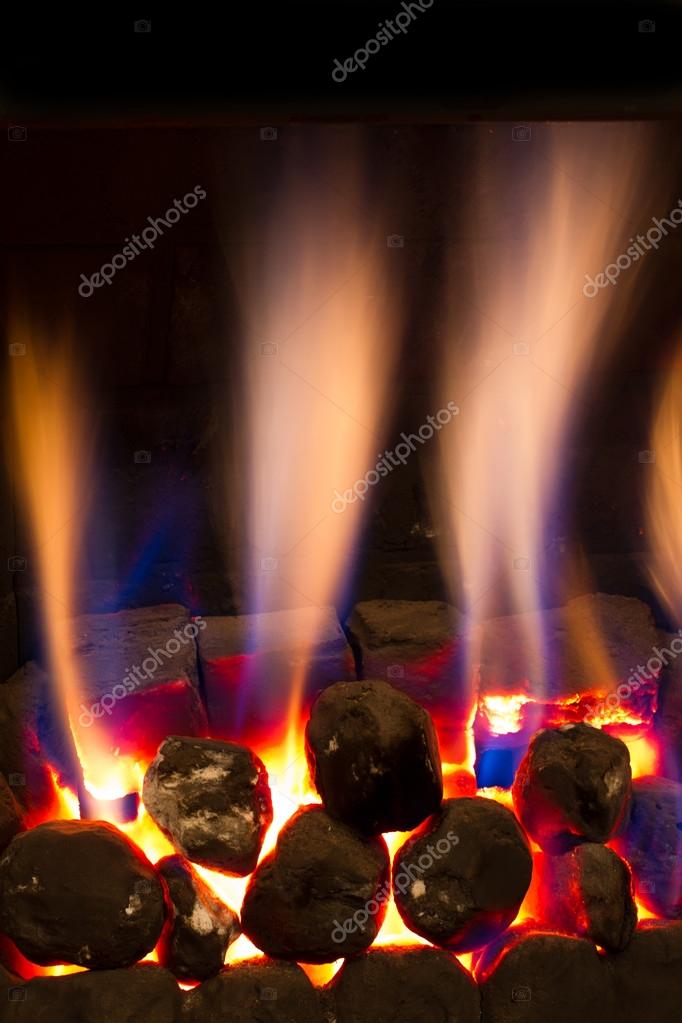 Gas fire burning strongly inside a modern home — Stock Photo ...