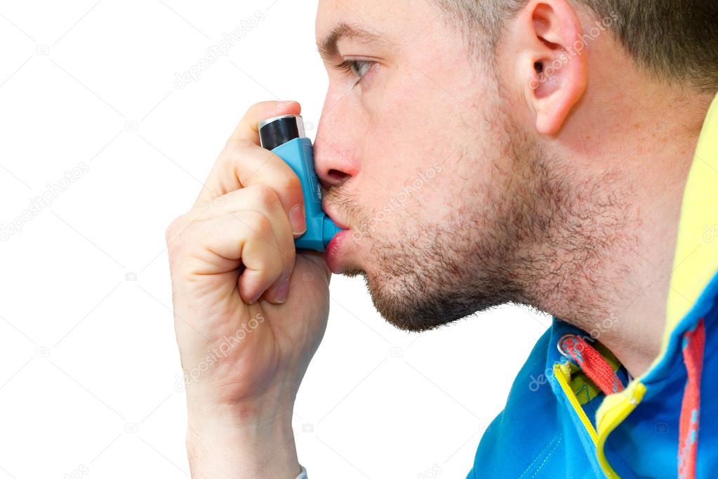 Man inhaling his asthma pump — Stock Photo © smikemikey1 #23232948