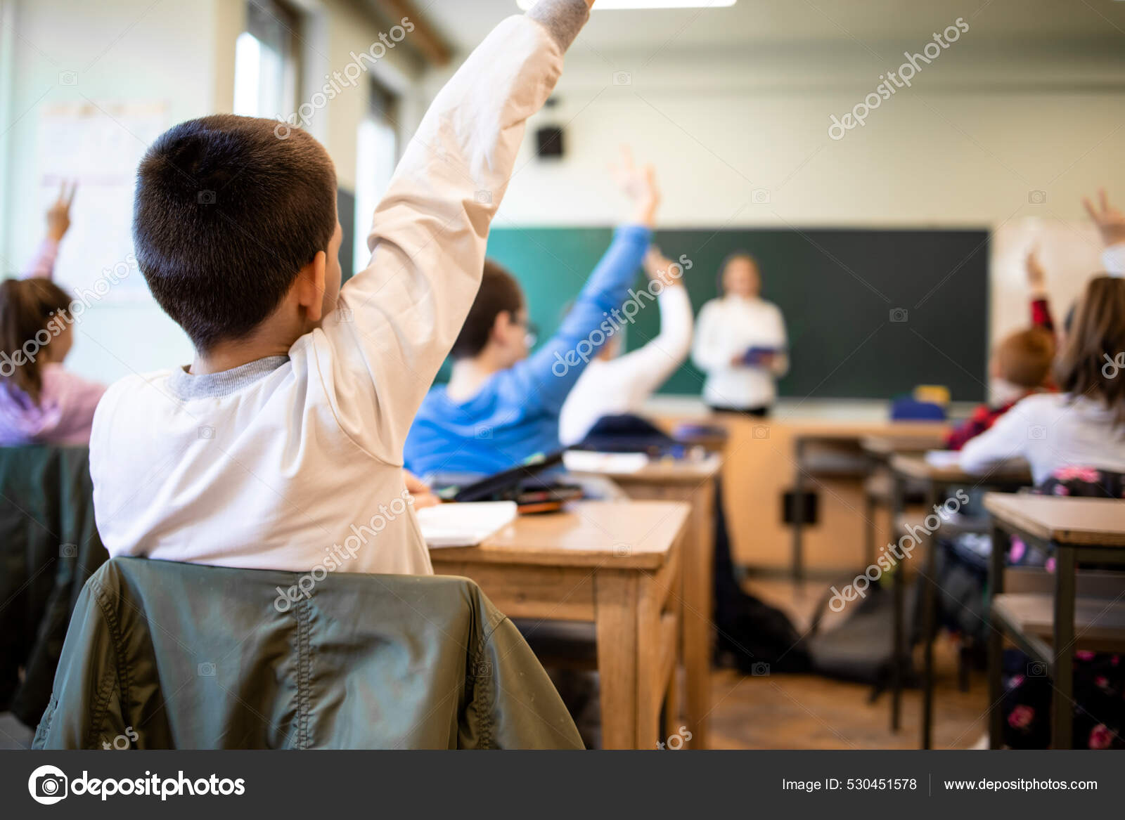 Children School Classroom Raised Hands Answering Teacher's Question ...