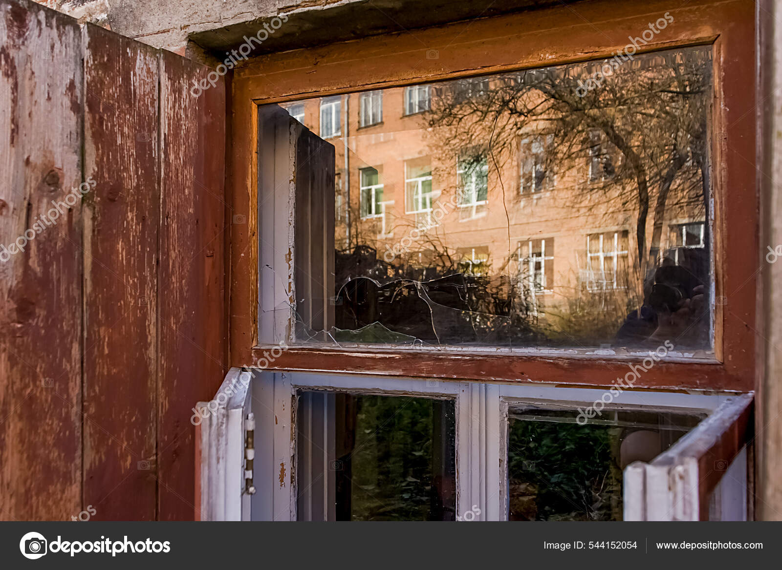 Broken Glass House Window